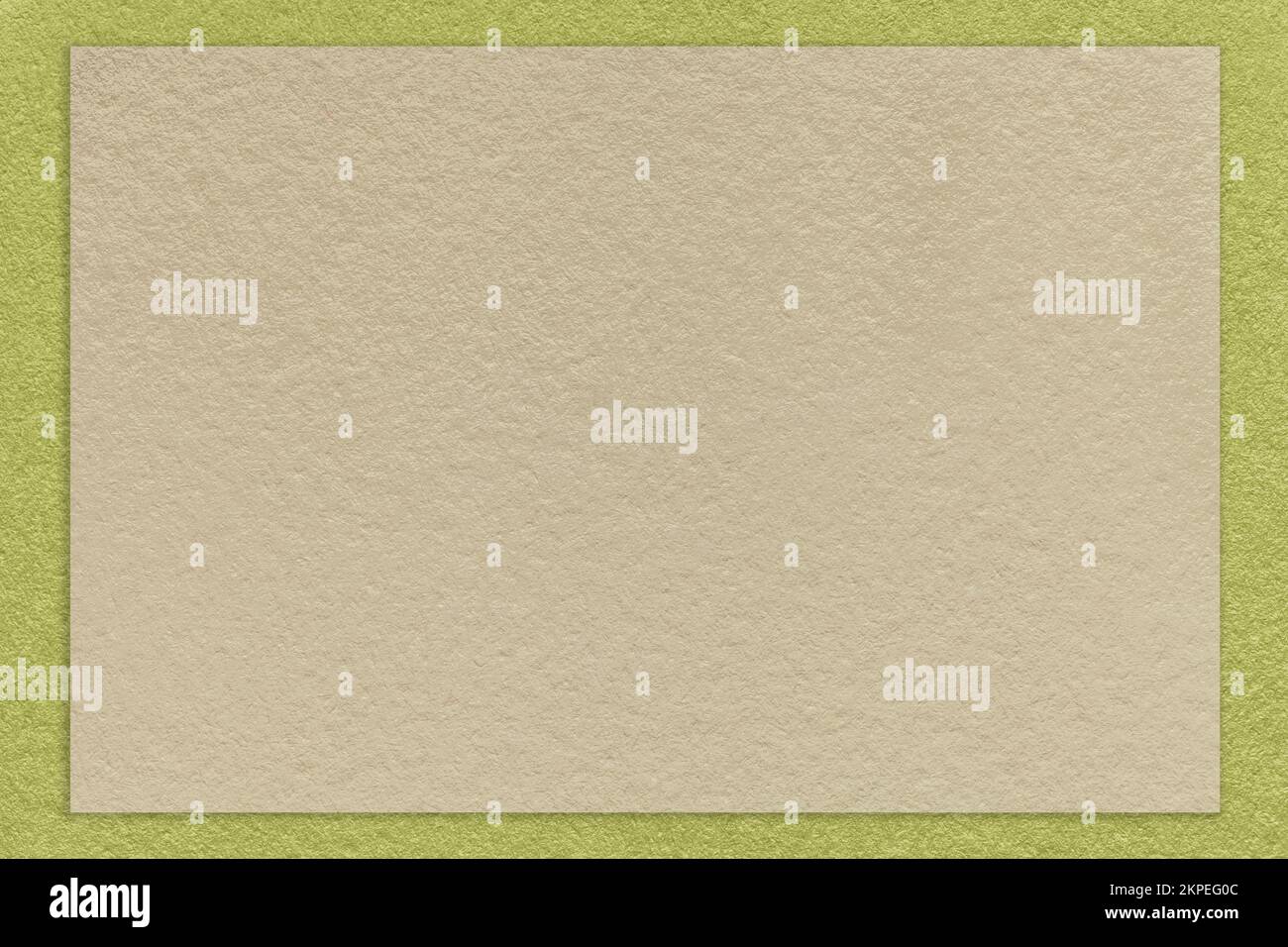 Texture of craft beige color paper background with green border, macro ...