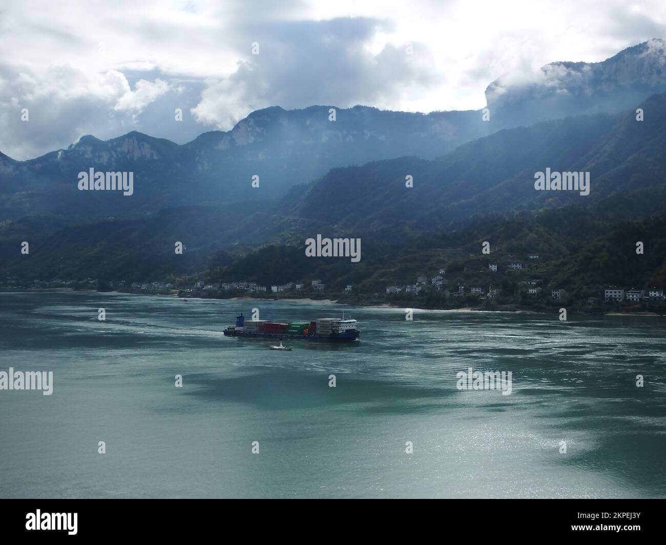 YICHANG, CHINA - NOVEMBER 22, 2022 - Cargo ships loaded with containers ...