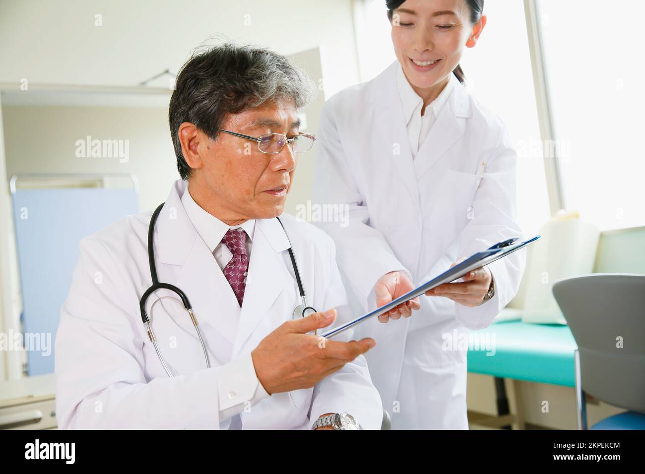 Japanese doctor in the clinic room Stock Photo - Alamy