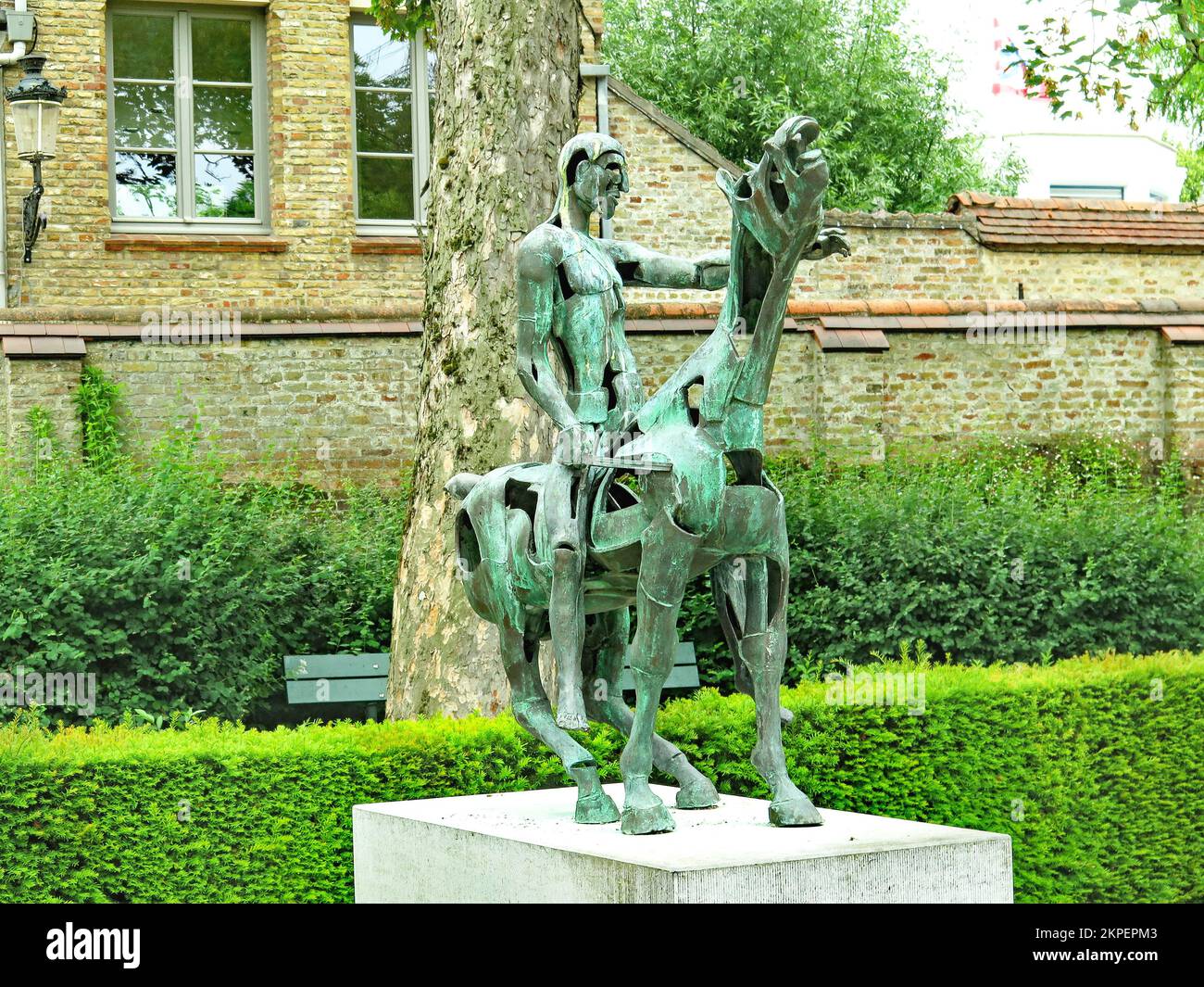 Sculpture of the apocalypse in a garden in Bruges, Belgium, Europe ...