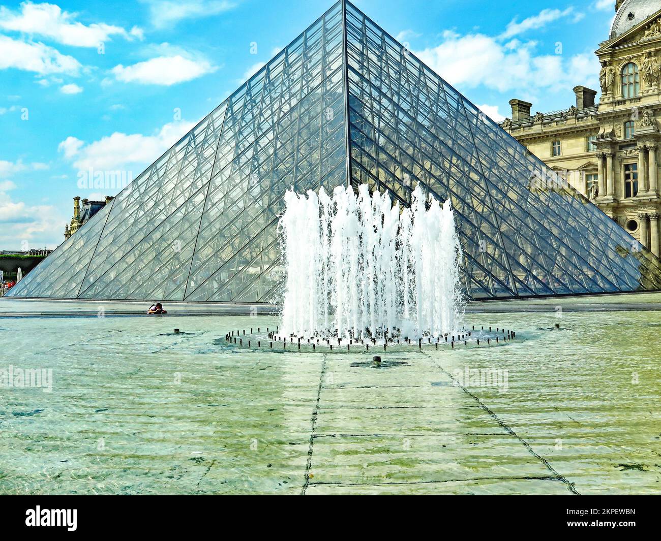 Fountain and glass dome of the Louvre museum, Paris, France, Europe ...