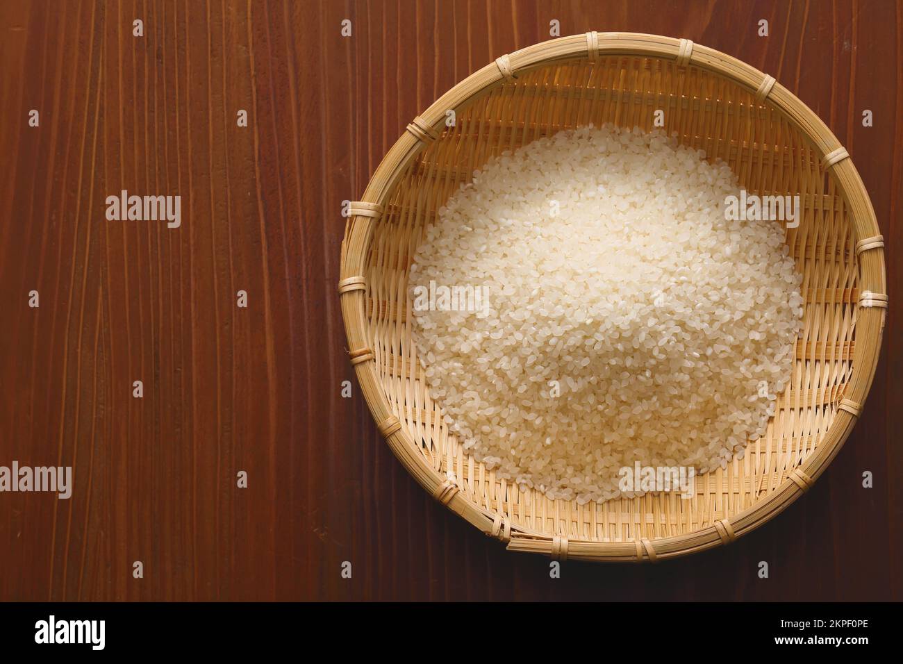 White rice in a strainer Stock Photo - Alamy