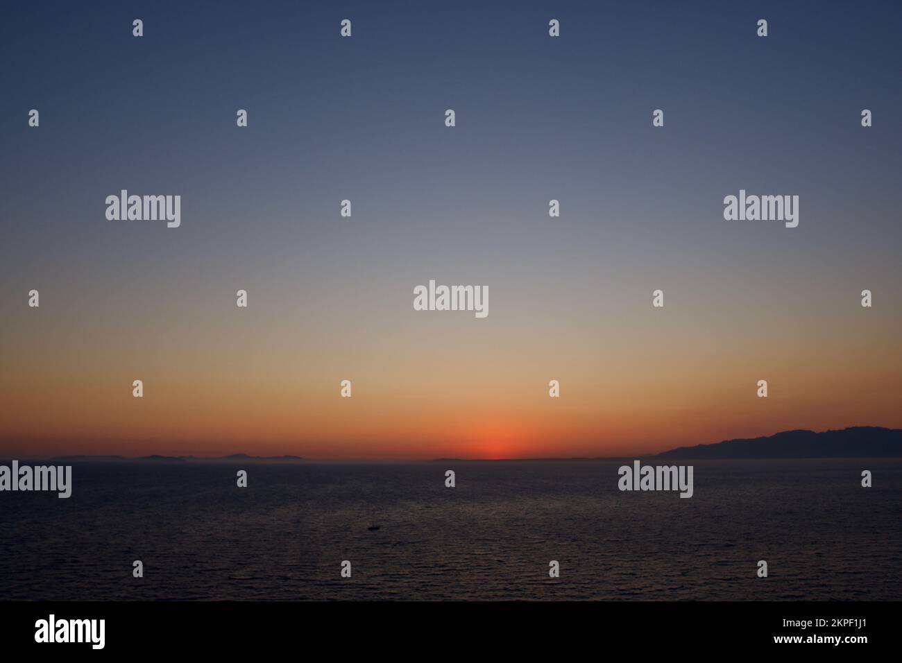 Southwestern tip of Turkey. Sunset from the ancient city of Datca Knidos. Yazikoy village harbor ...