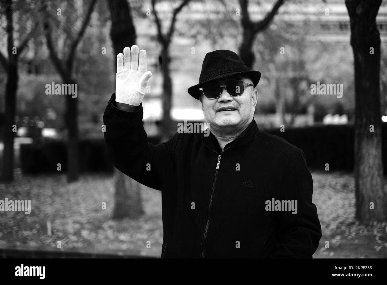 Old man waving goodbye Black and White Stock Photos & Images - Alamy
