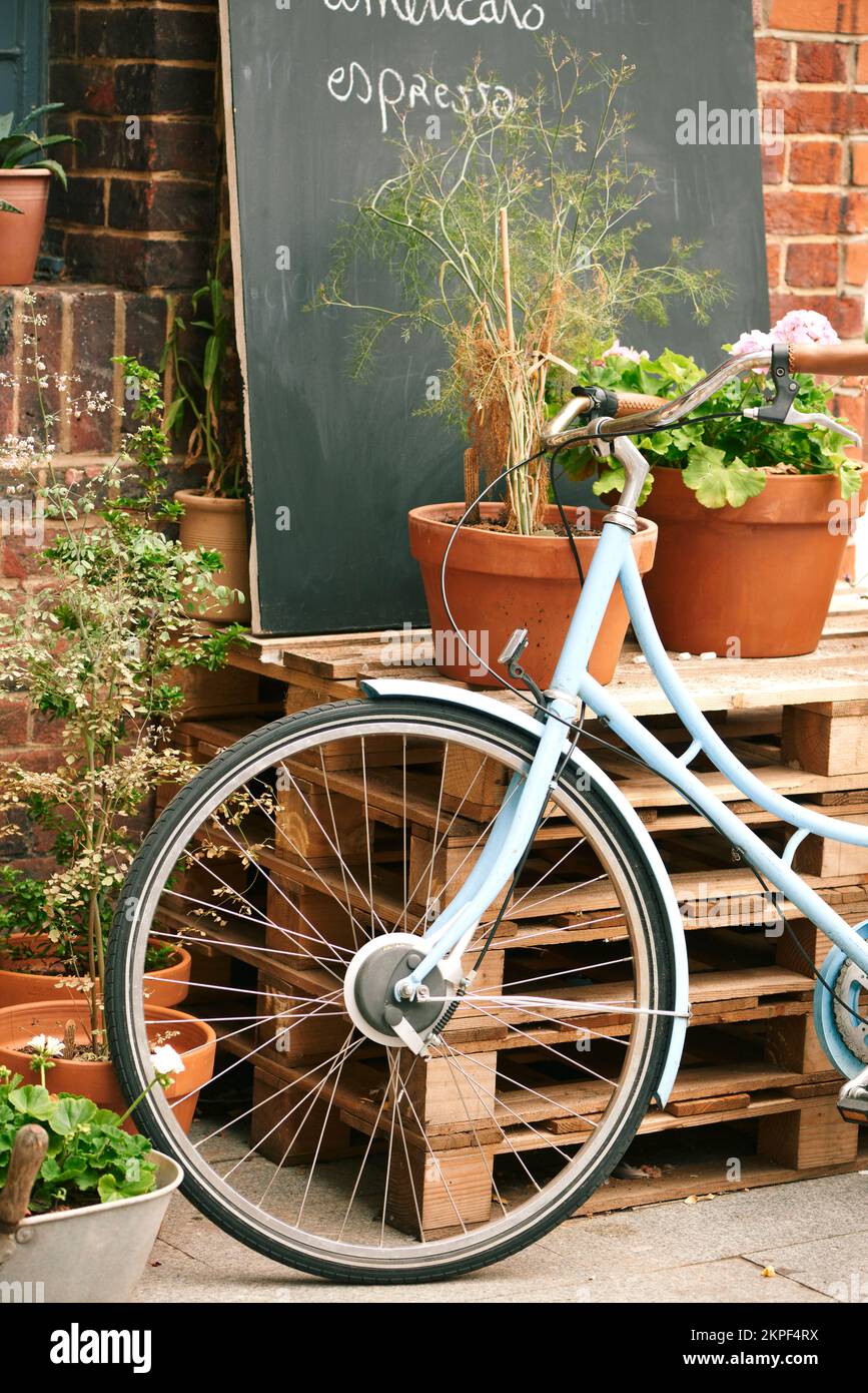 Bicycle, cafe and small business outdoor restaurant or coffee shop for ...
