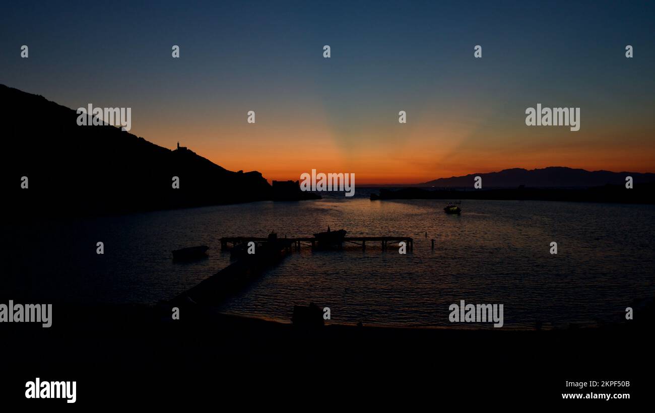 Southwestern tip of Turkey. Sunset from the ancient city of Datca Knidos. Yazikoy village harbor ...