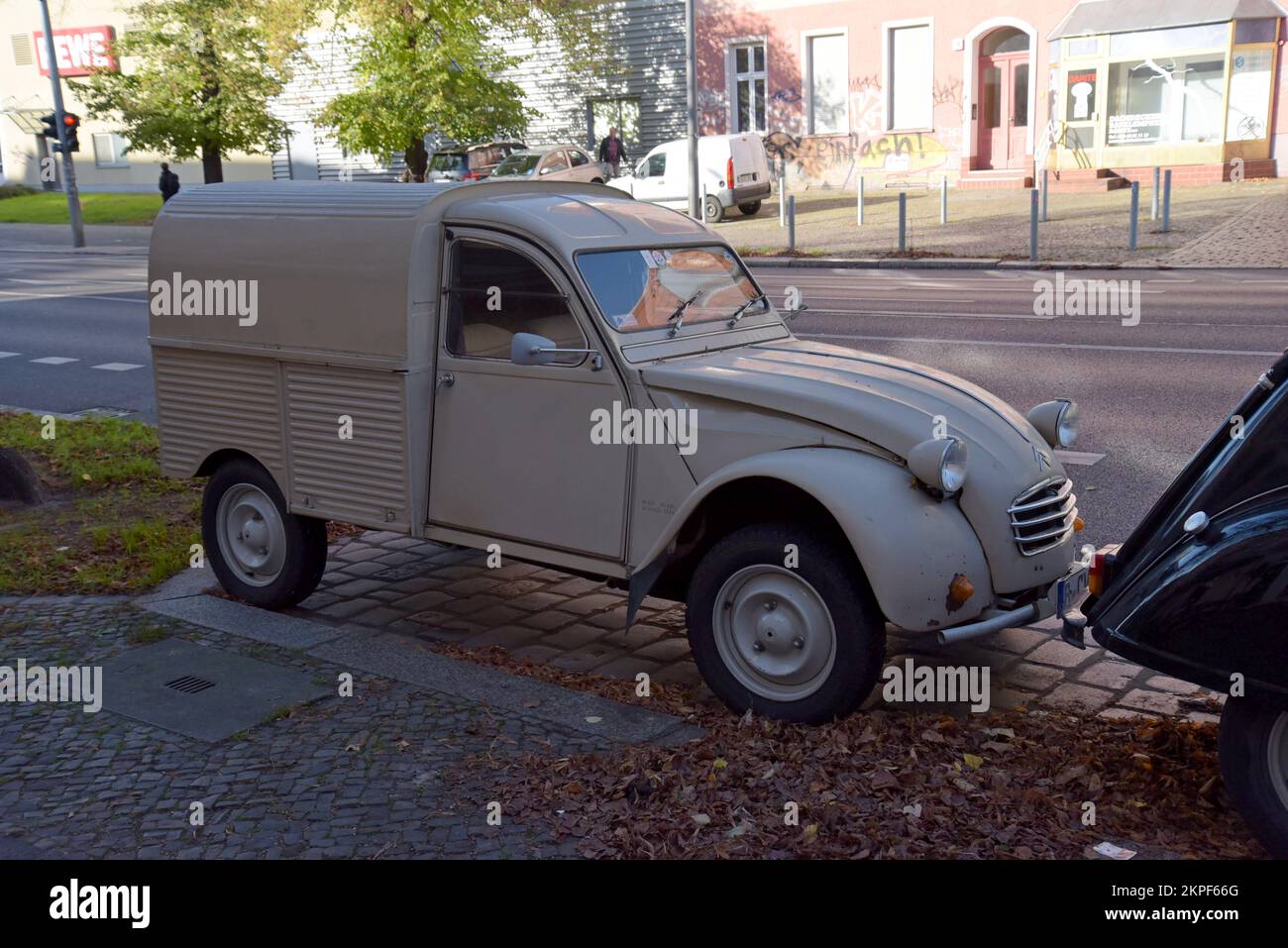 Classic retro Citroen 2CV car and 2CV AU van seen in a Berlin side ...
