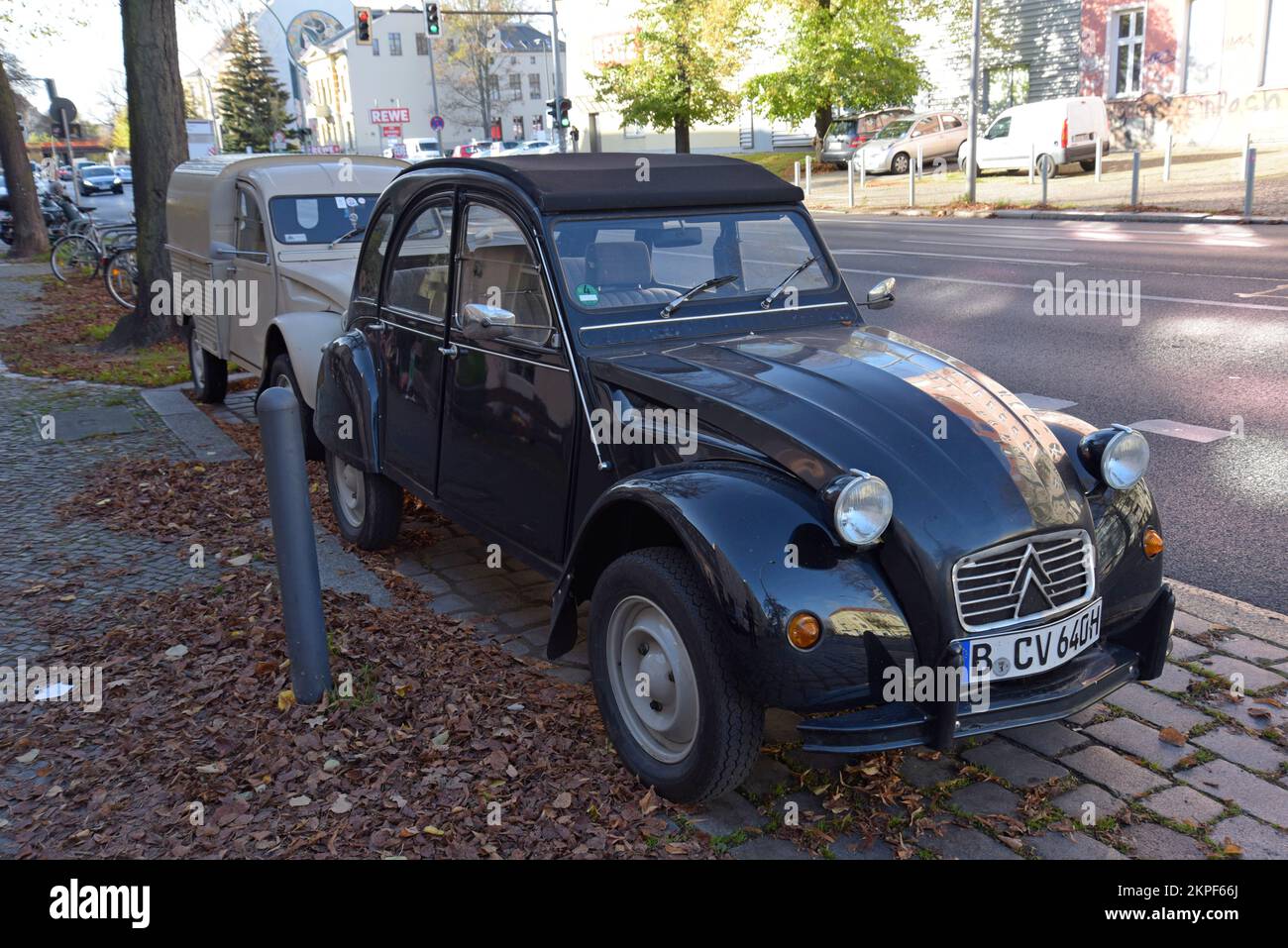 Classic retro Citroen 2CV car and 2CV AU van seen in a Berlin side ...