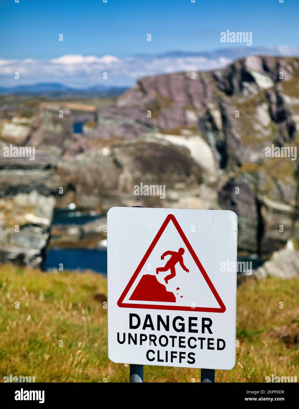 Danger unprotected cliffs sign and pictogram at Mizen Head Cliffs ...