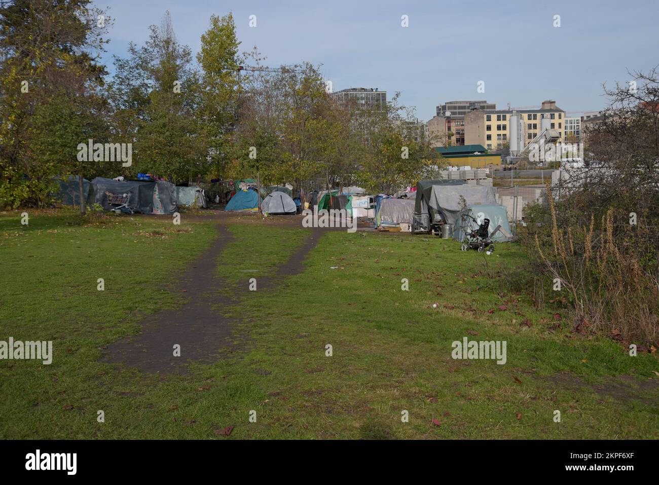 A tent city of homeless people sleeping rough in tents & other ...