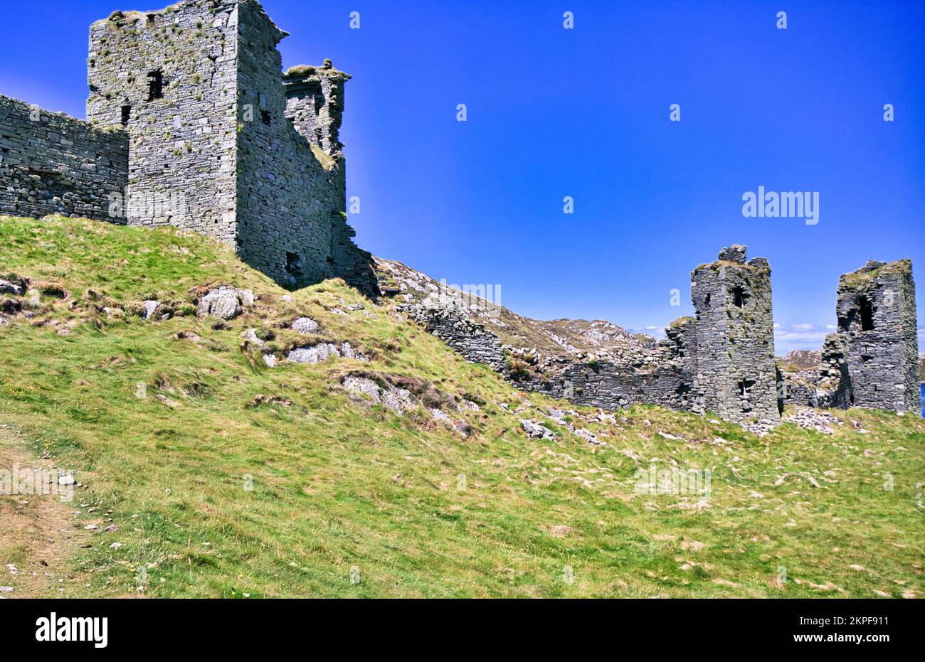 13th Century Dunlough Castle set atop cliffs on Three Castle Head ...