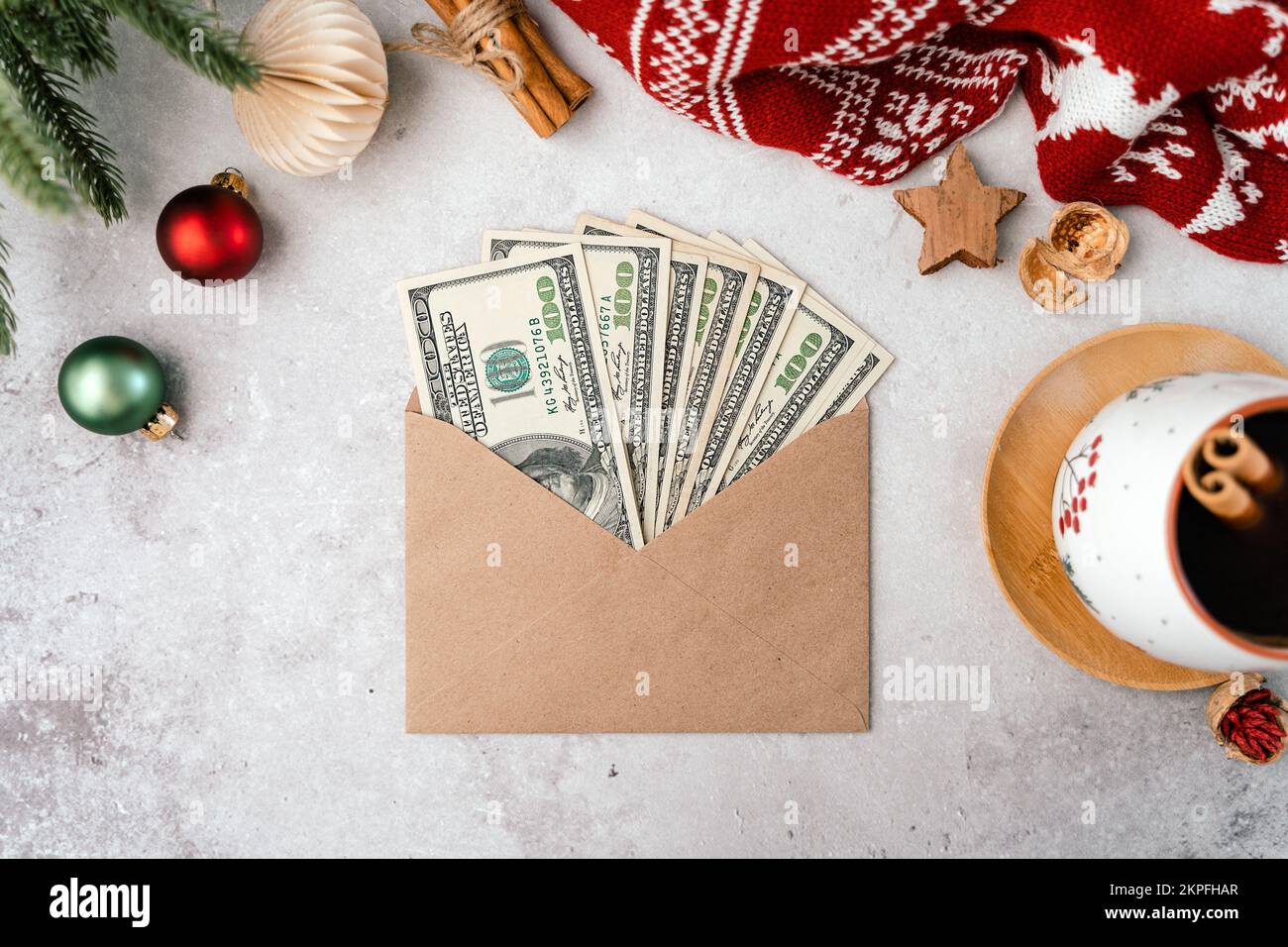 Paper envelope with money dollars bills for Christmas gifts. Top view ...