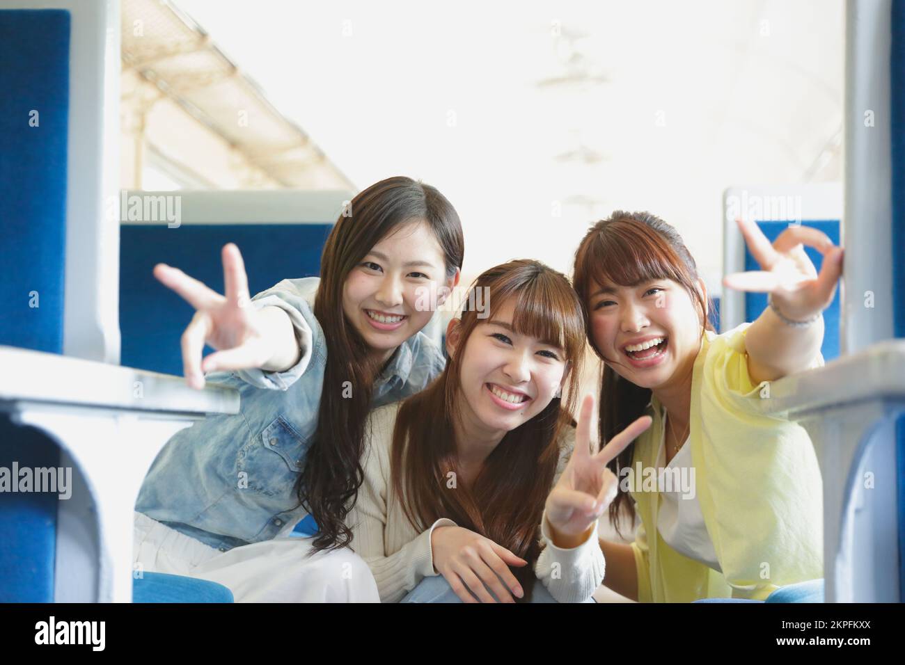 Japanese women having fun on the train Stock Photo - Alamy