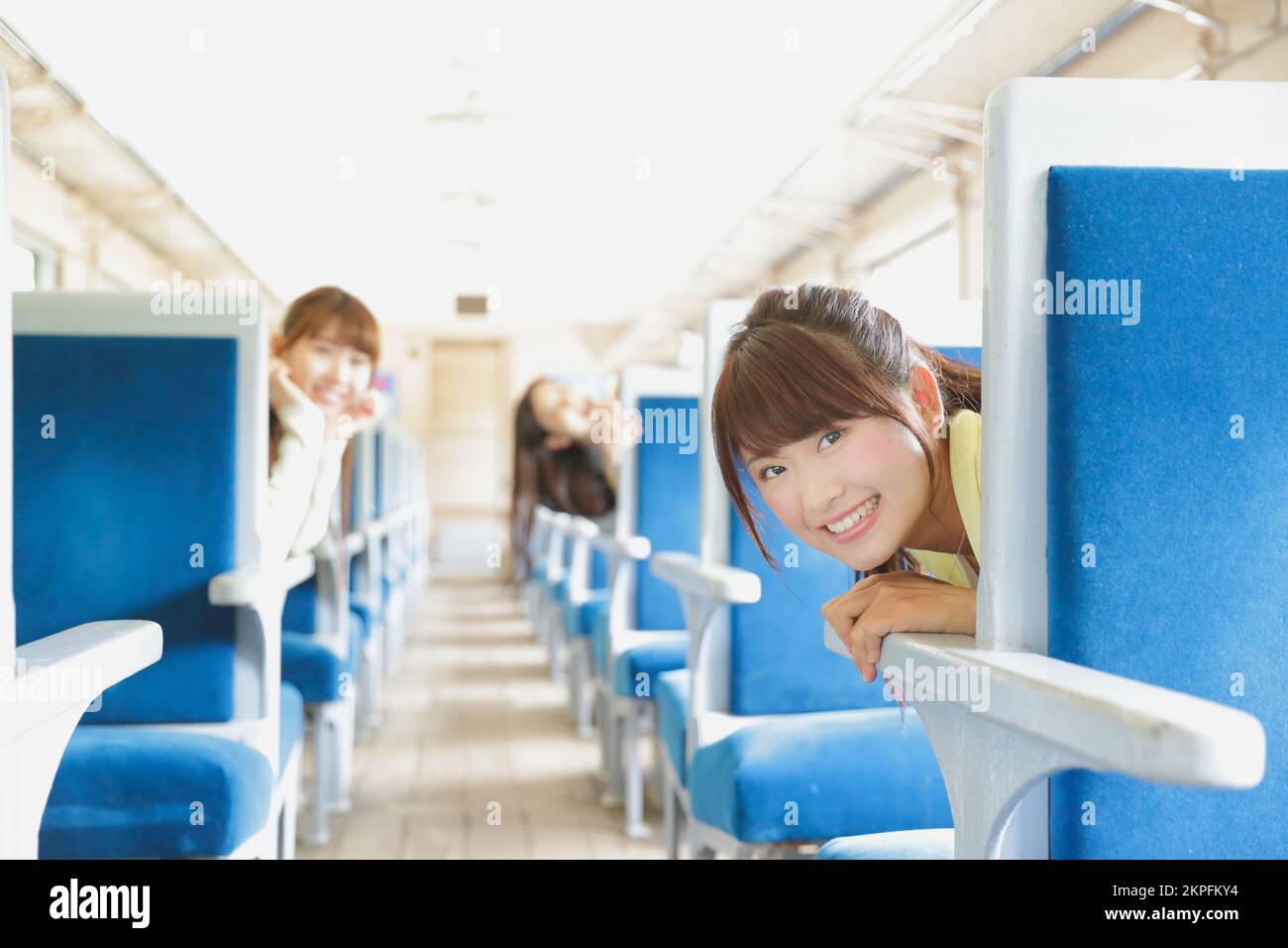 Japanese women having fun on the train Stock Photo - Alamy