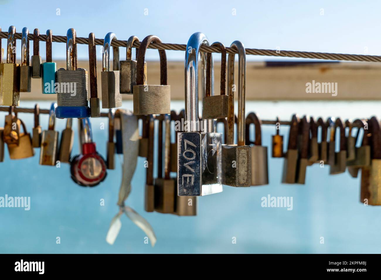 Love padlocks hanging on the bridge. Concept of love and relationships ...
