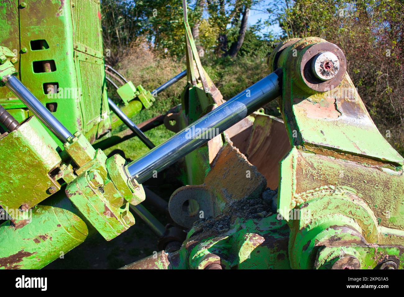 Komatsu amphibious dozer on a river bank in autumn day Stock Photo - Alamy