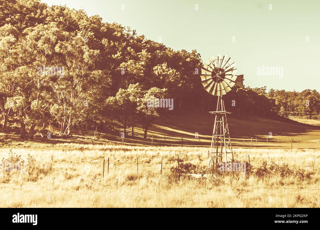 Old fashioned photography of an water pump windmill in Australian ...
