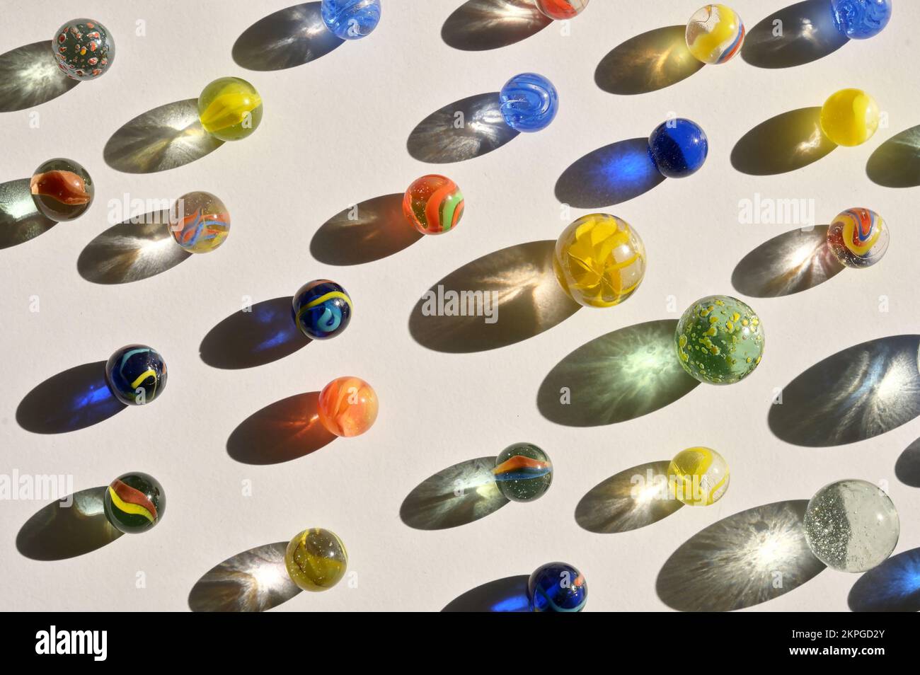 Abstract closeup of a bunch of marbles and shadows Stock Photo - Alamy