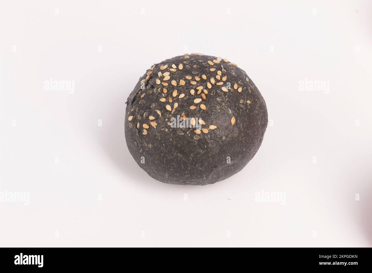 Colorful seasoned bread resting on a white background Stock Photo - Alamy