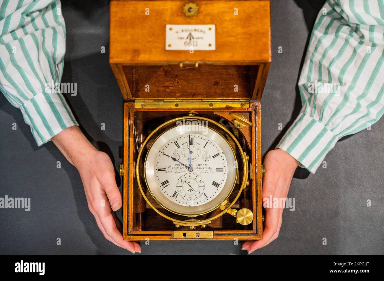London, UK. 28th Nov, 2022. An early 20th century mahogany two-day ...