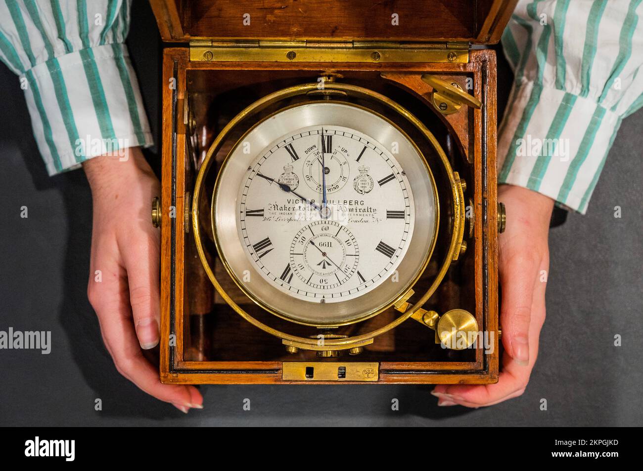 London, UK. 28th Nov, 2022. An early 20th century mahogany two-day ...