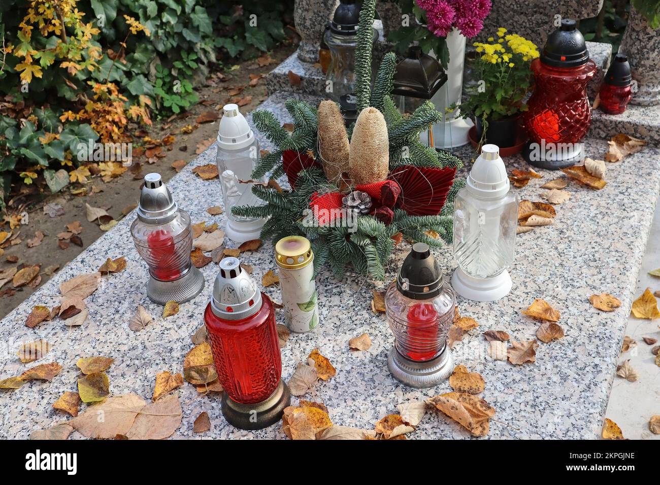 Lanterns on the tombstone in the public cemetery Stock Photo - Alamy