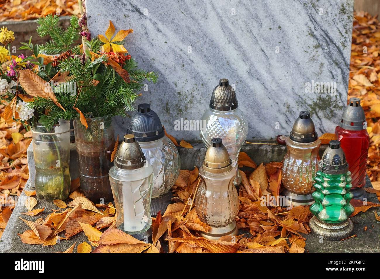 Lanterns on the tombstone in the public cemetery Stock Photo - Alamy