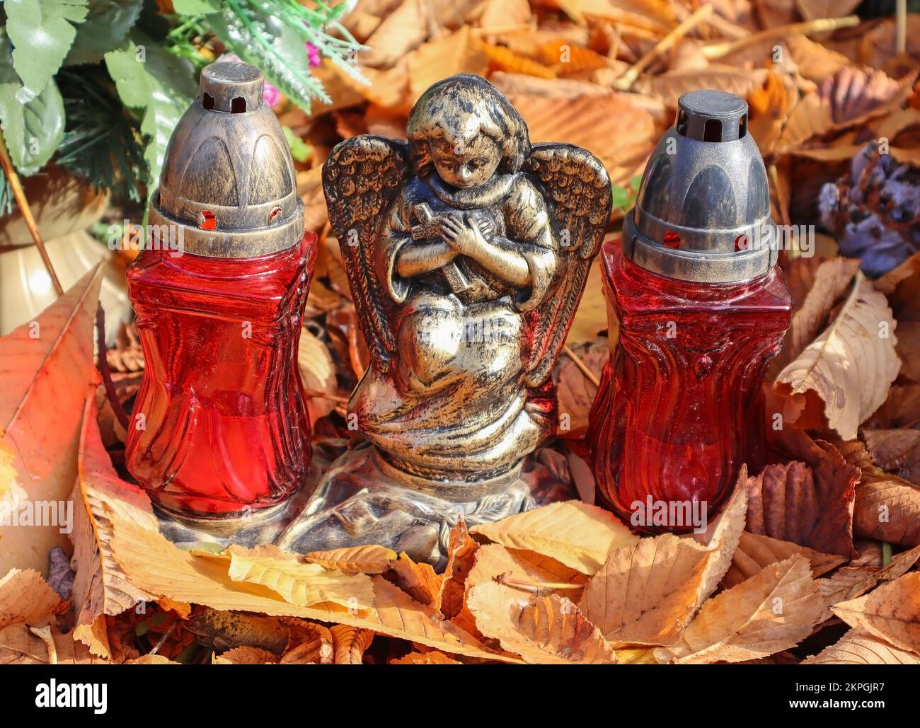 Lanterns on the tombstone in the public cemetery Stock Photo - Alamy