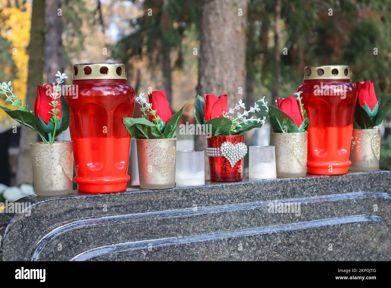 Lanterns on the tombstone in the public cemetery Stock Photo - Alamy