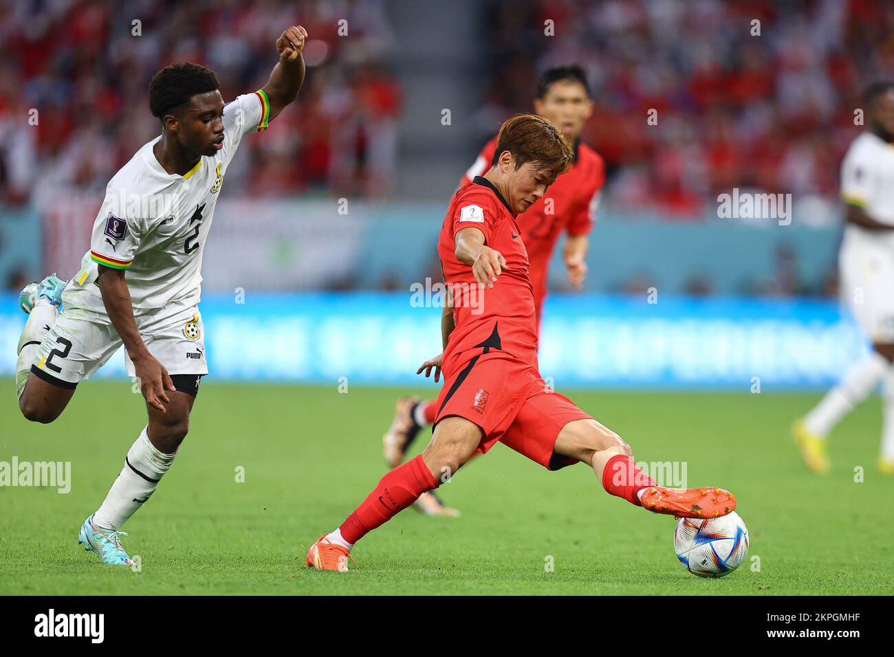 Tariq Lamptey, Jinsu Kim during the FIFA World Cup Qatar 2022 Group H ...