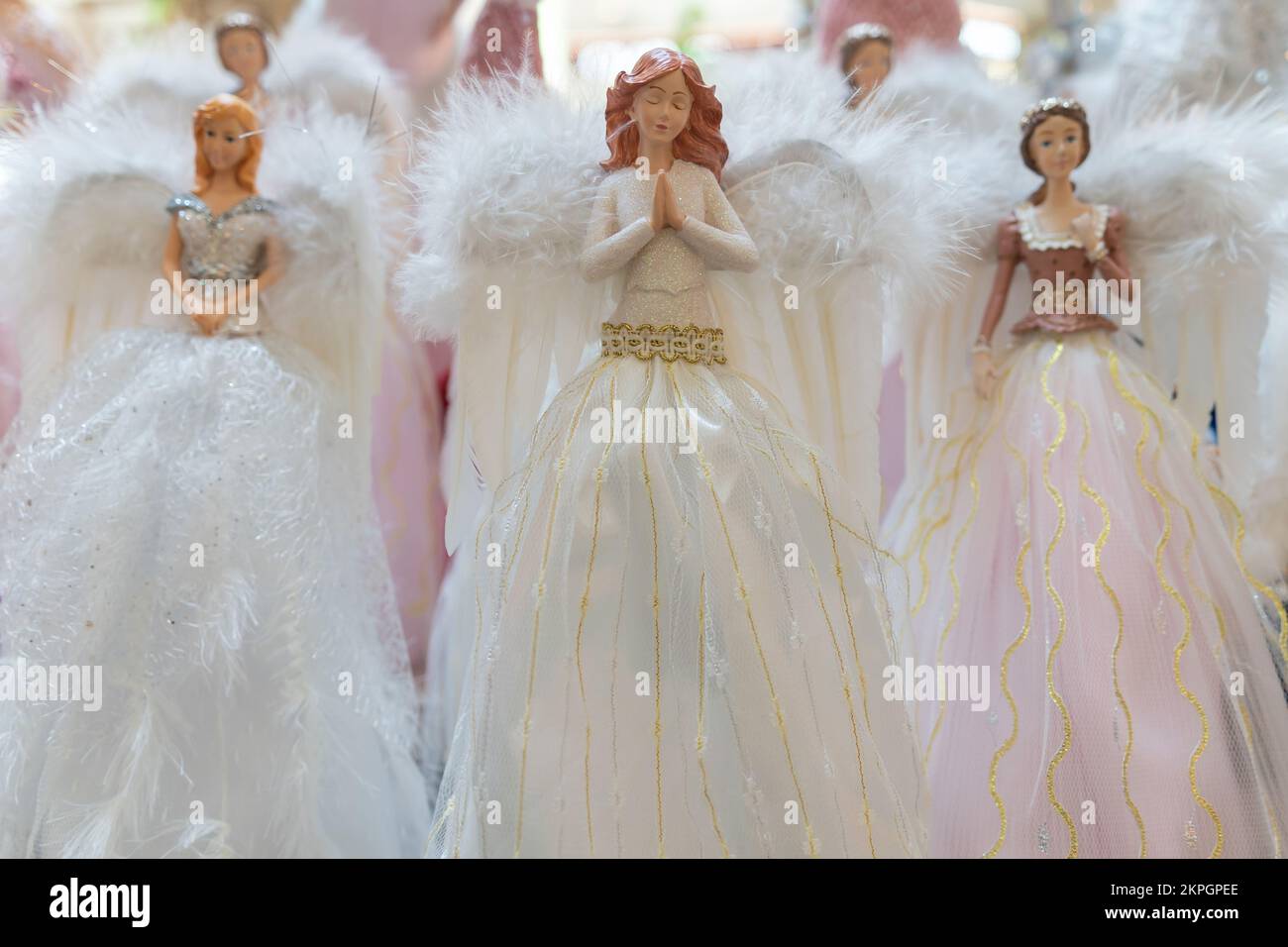Woman and angel figurines hi-res stock photography and images - Alamy