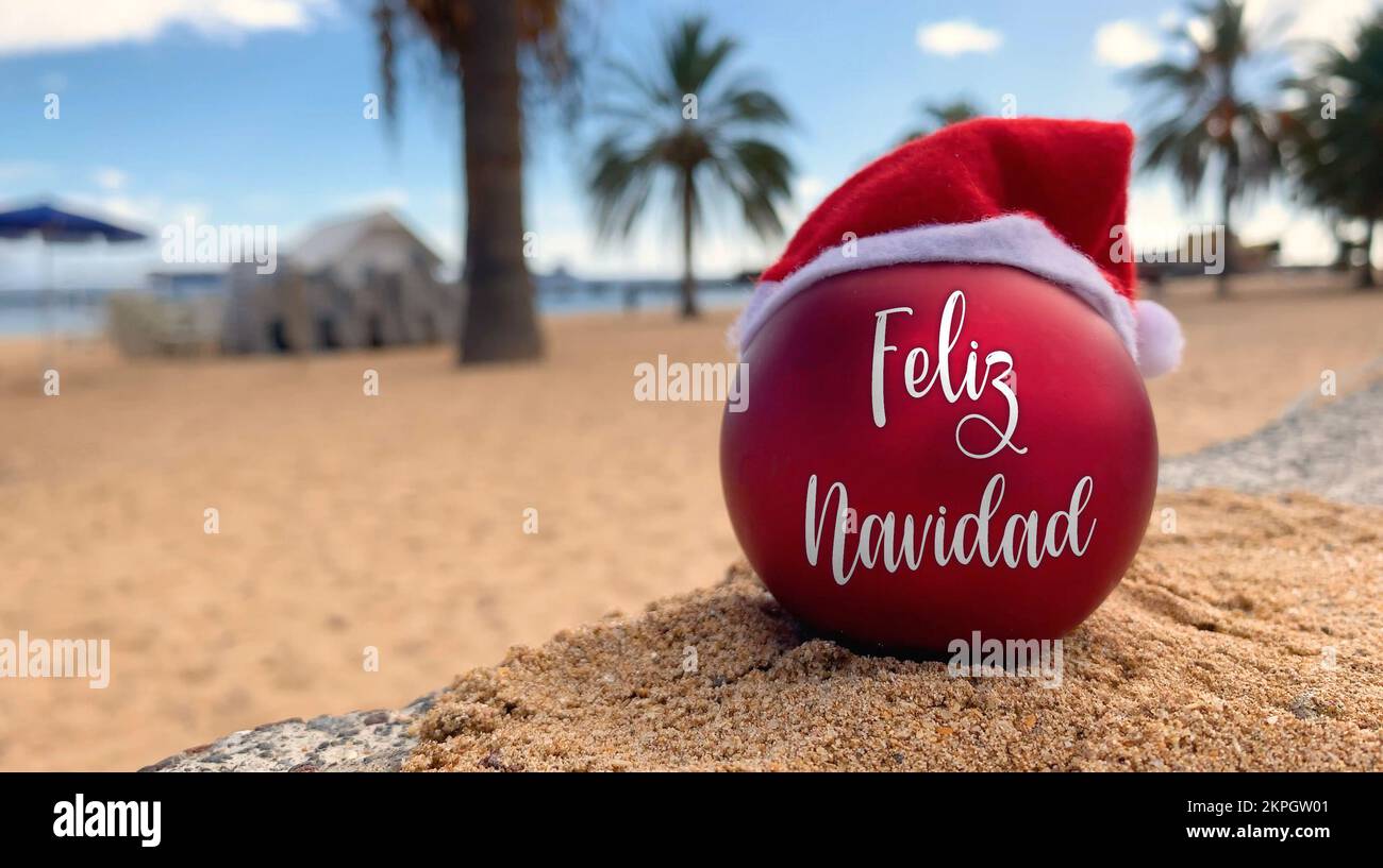 Christmas bomb in Santa's hat with words Merry Christmas in spanish on ...