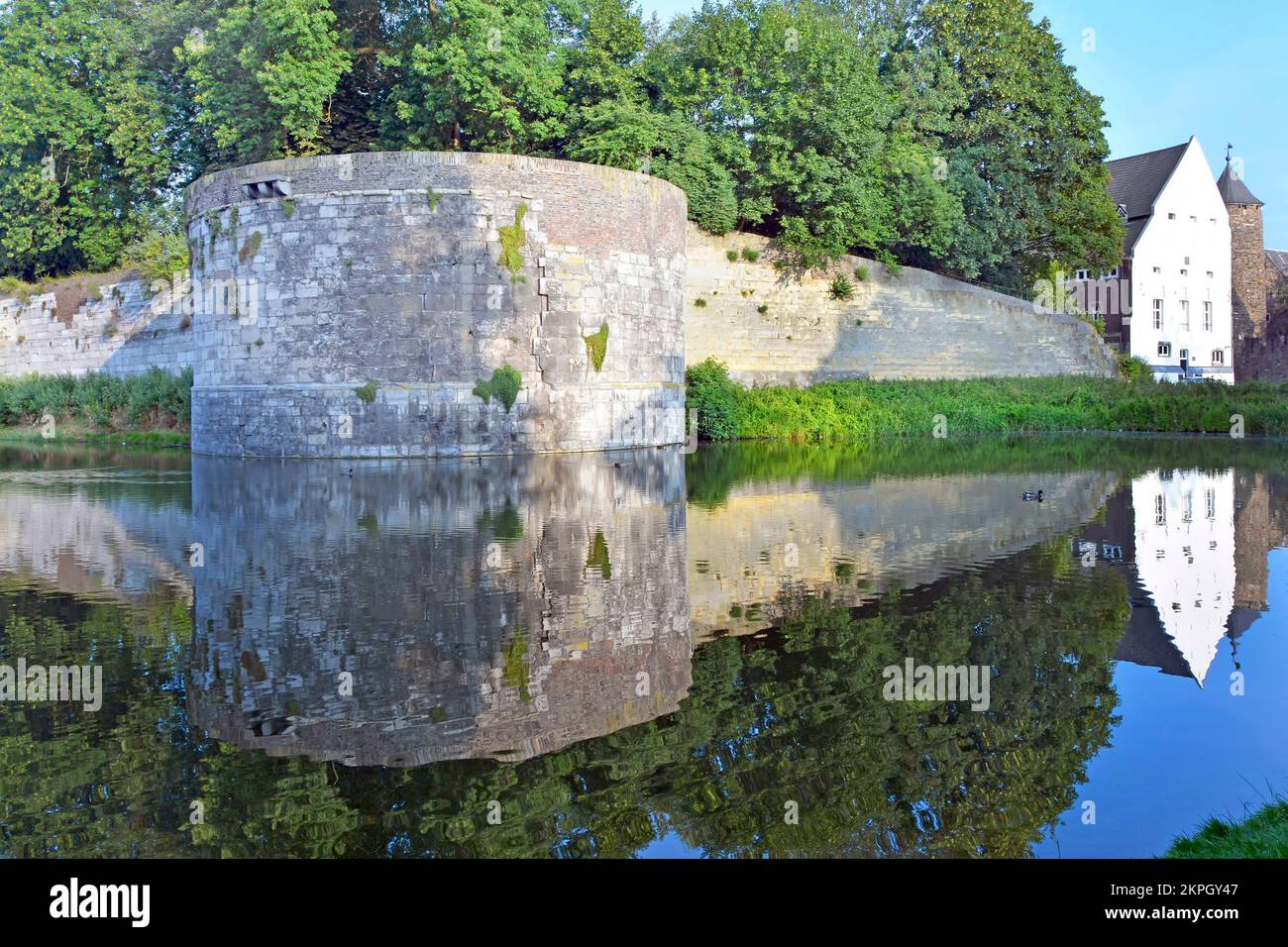 Still pond water in Stadspark a Maastricht public park semi circular ...