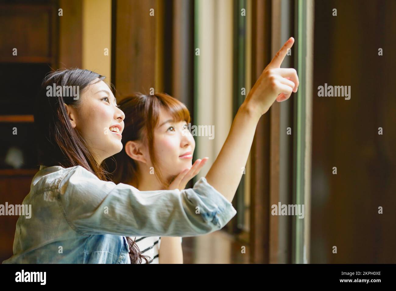 Japanese women having a conversation Stock Photo - Alamy