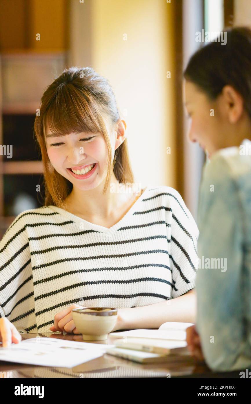 Japanese women having a conversation Stock Photo - Alamy