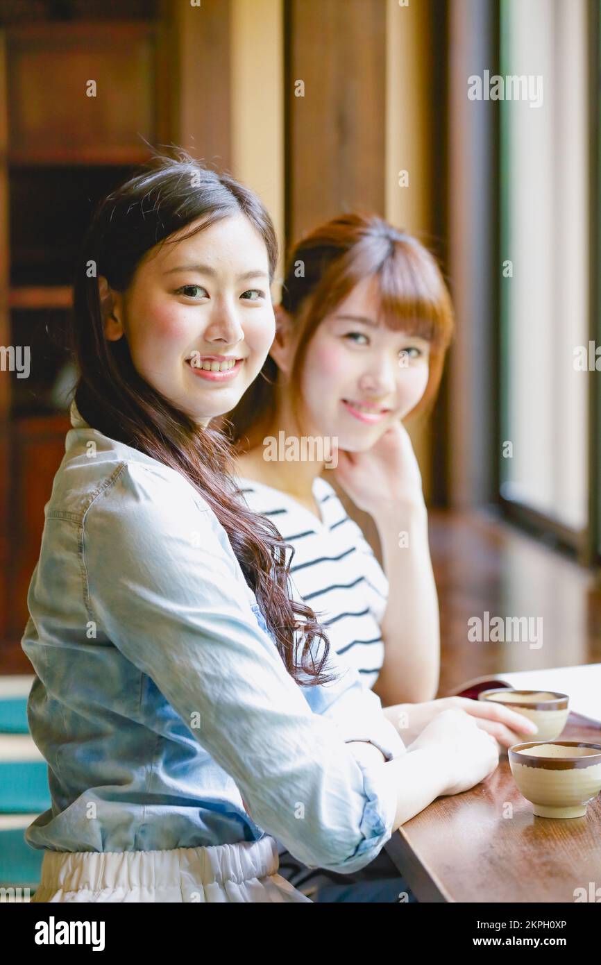 Japanese women having a conversation Stock Photo - Alamy