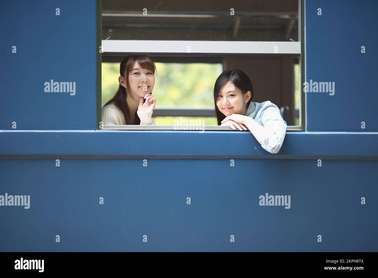 Japanese women traveling by train Stock Photo - Alamy