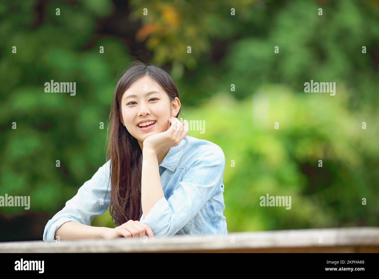 Fresh greenery and Japanese woman Stock Photo - Alamy