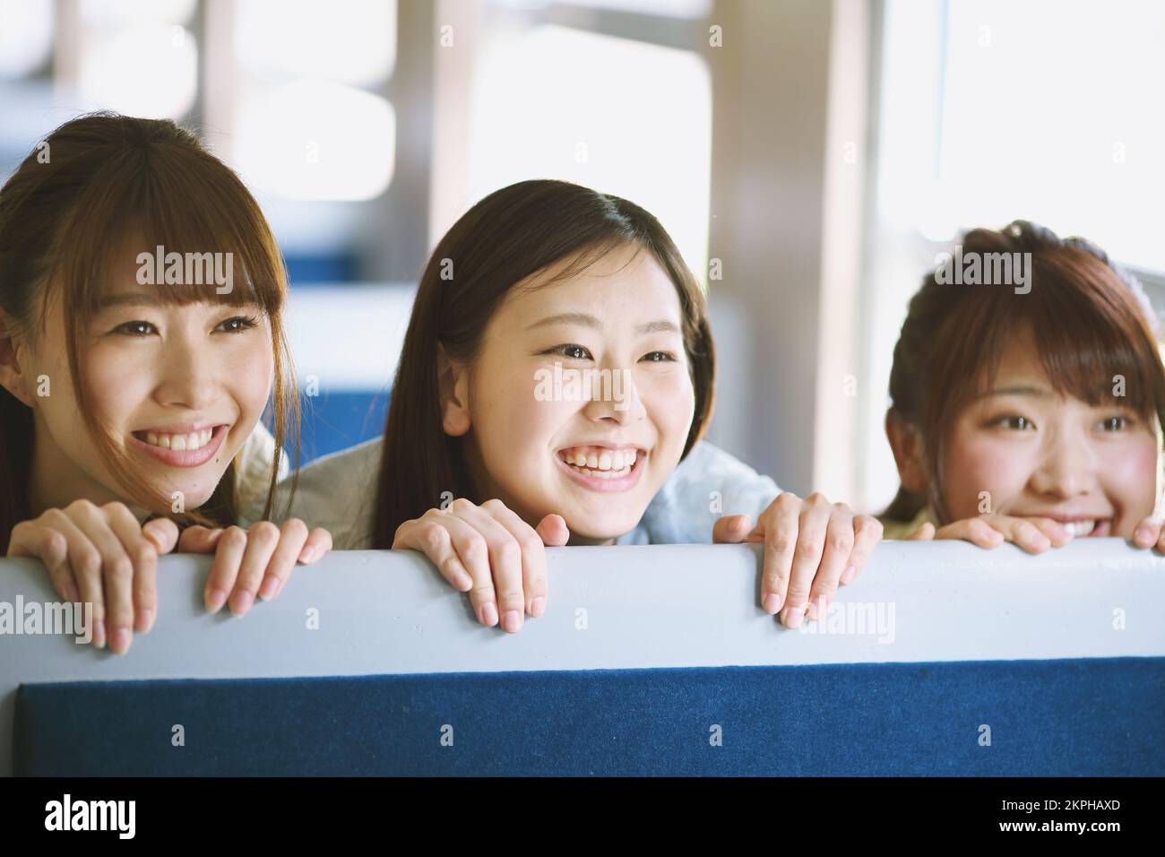 Japanese women having fun on the train Stock Photo - Alamy