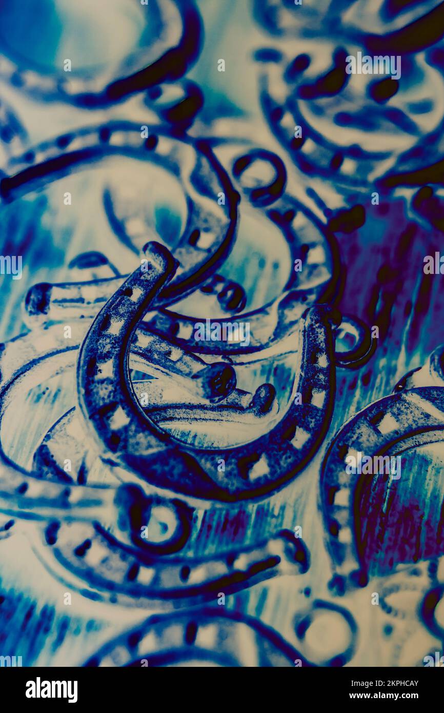 Abstract inversion on a mix of horse shoes in blue tone. Winning blue ...