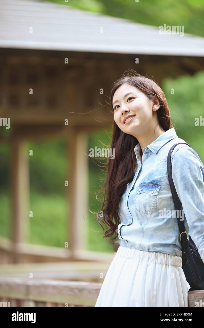 Leaning solo asian woman hi-res stock photography and images - Alamy