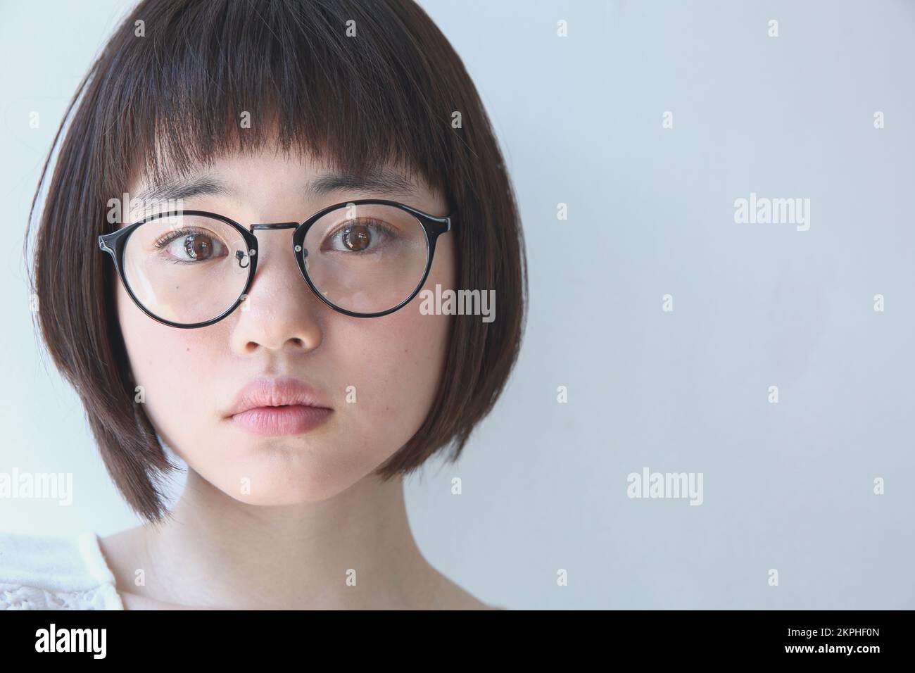Young Japanese woman wearing glasses Stock Photo - Alamy
