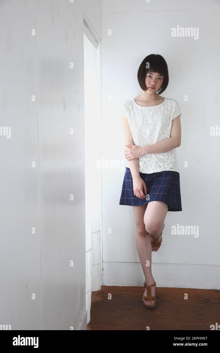 Young Japanese woman with short hair Stock Photo - Alamy