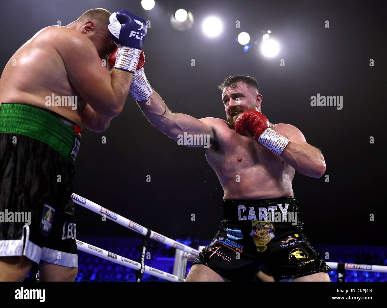 Thomas Carty (right) and Pavlo Krolenko in the heavy weight bout at the OVO Arena Wembley ...
