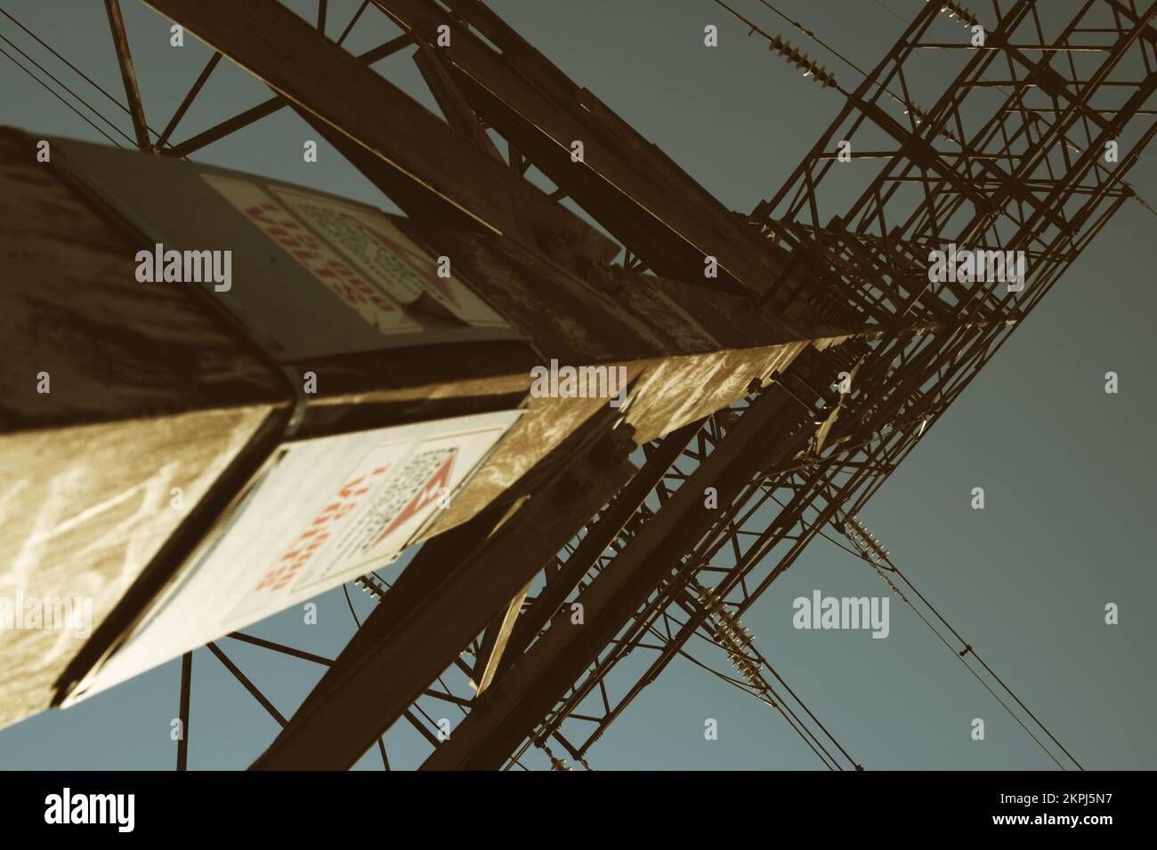 Electric tower from below Stock Photo - Alamy