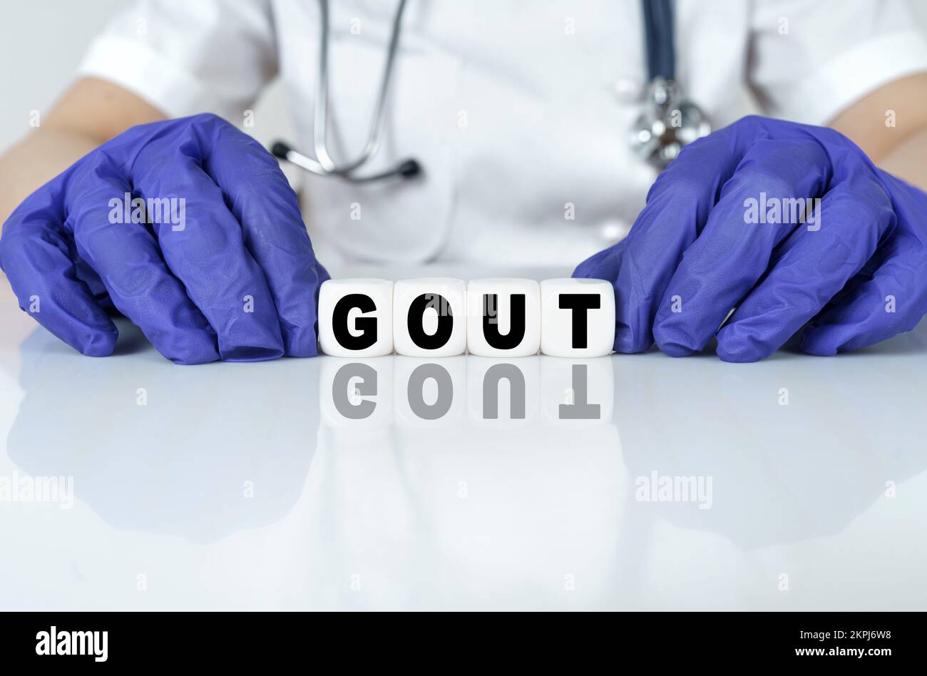 Medicine and health concept. The doctor put together a word from cubes ...