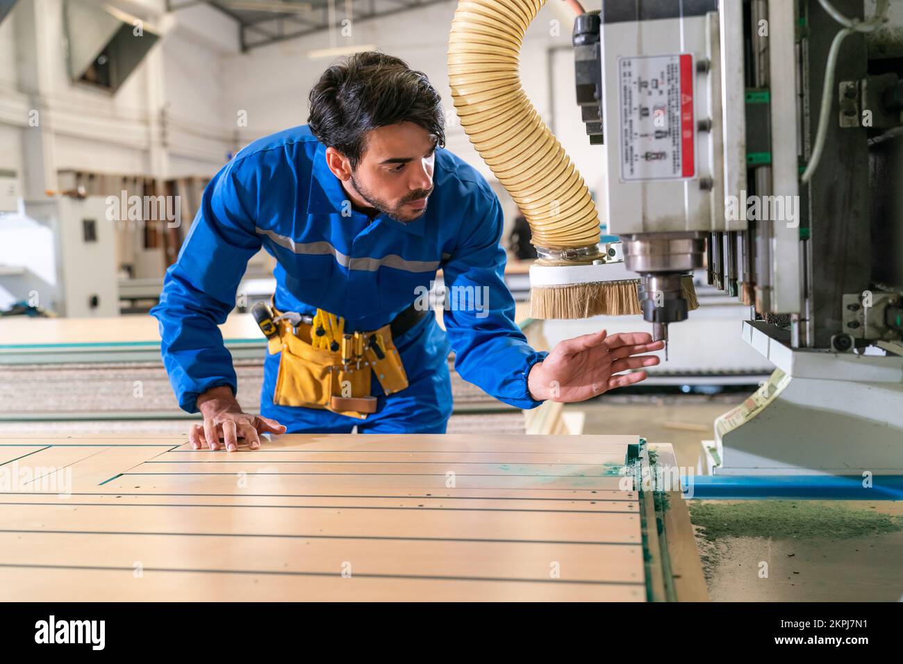 Carpenter making furniture in workshop Stock Photo - Alamy