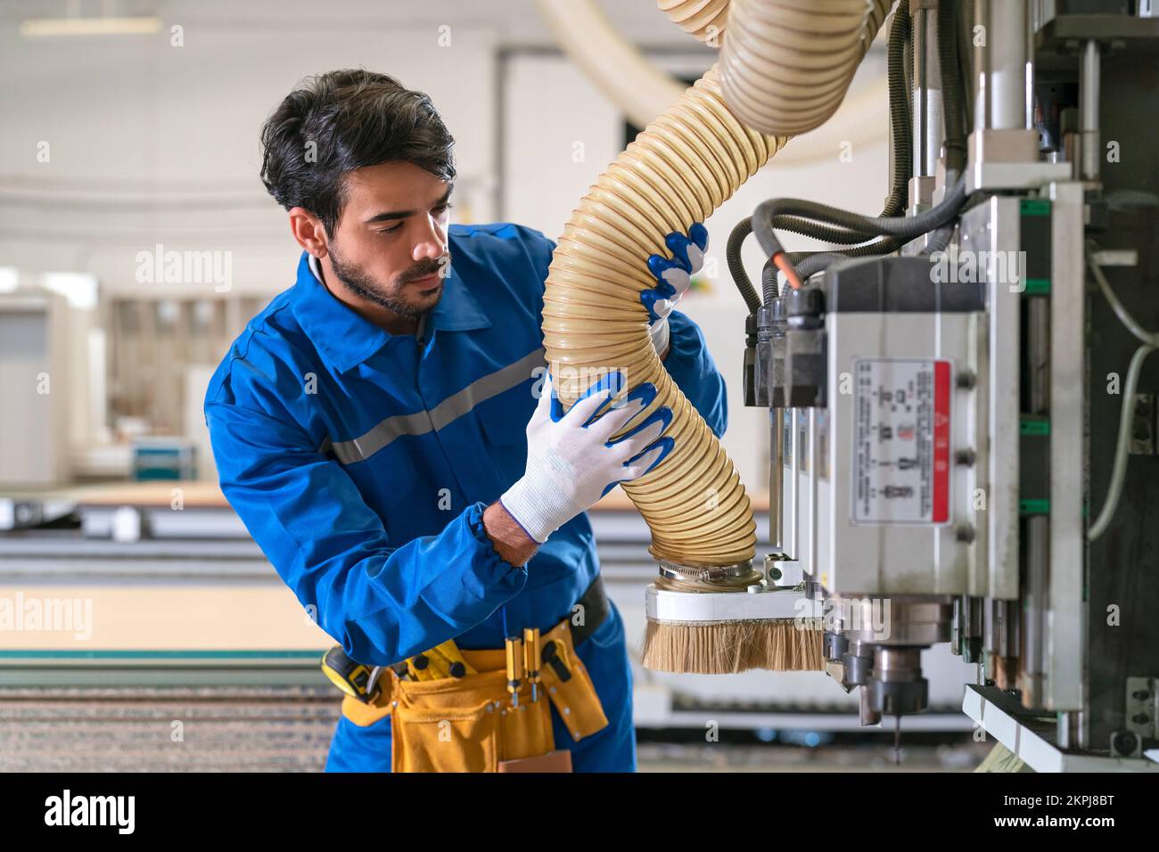 Carpenter making furniture in workshop Stock Photo - Alamy