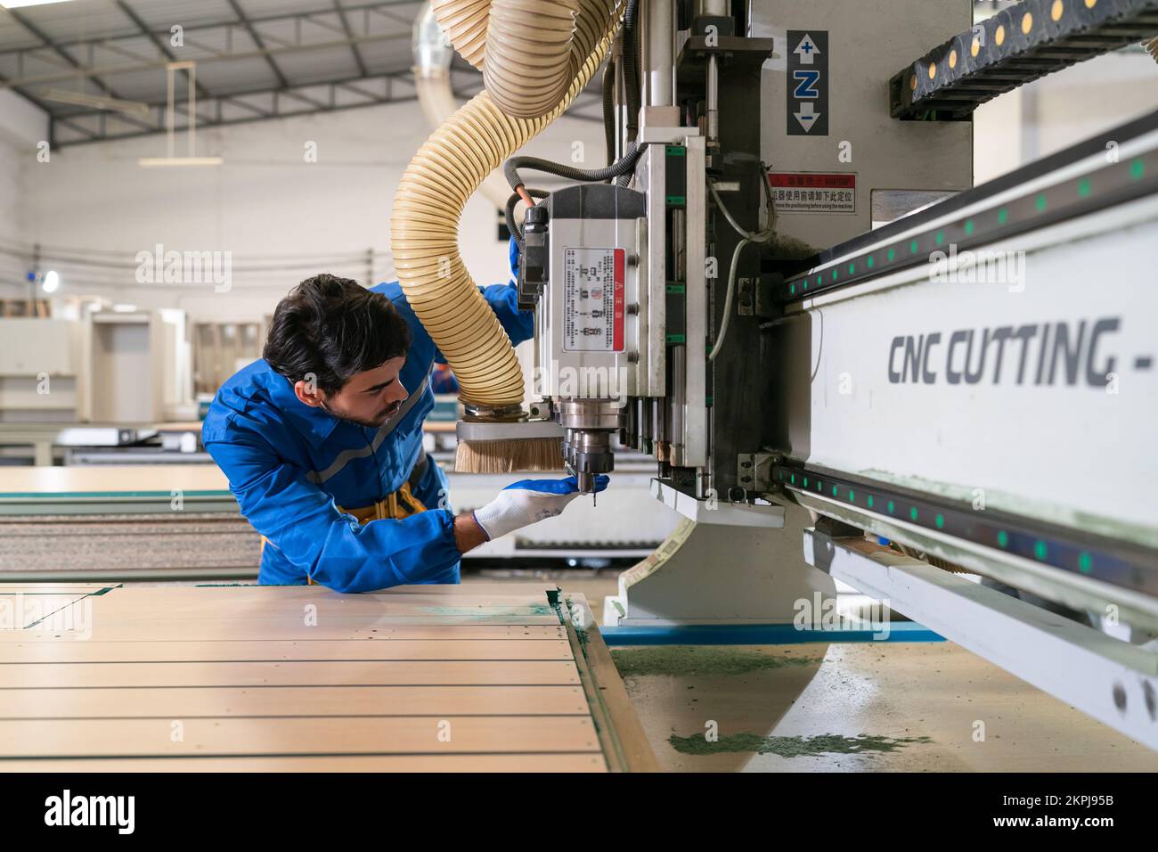 Carpenter making furniture in workshop Stock Photo - Alamy