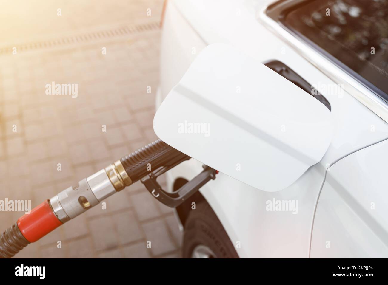 Transport and industry concept. Refilling the car. A refueling valve is ...